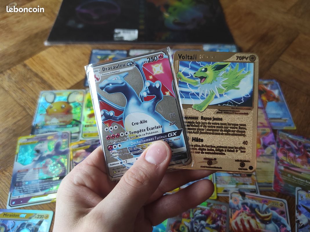 Carte pokémon lot avec cahier et 2 carte metalique - Collection
