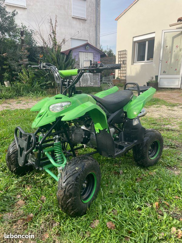 Quad 125 automatique prêt à roule presque neuf - Motos