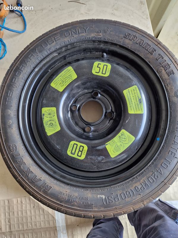 Roue de secours "Galette" - Équipement auto