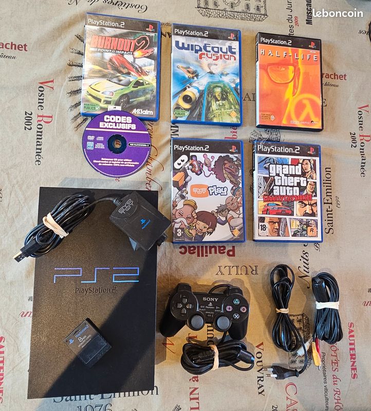 Playstation 2 + 5 jeux, manette et caméra... - Consoles