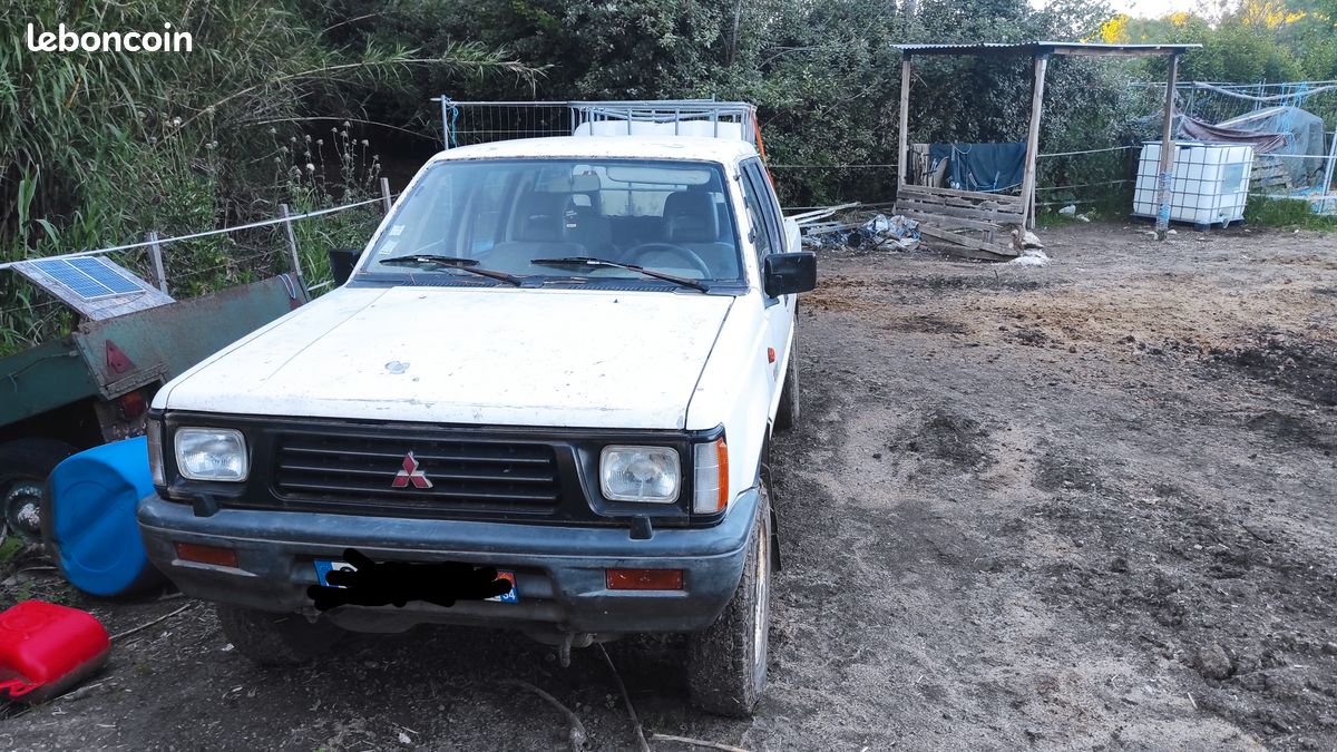 Mitsubishi L200 K34 - Voitures
