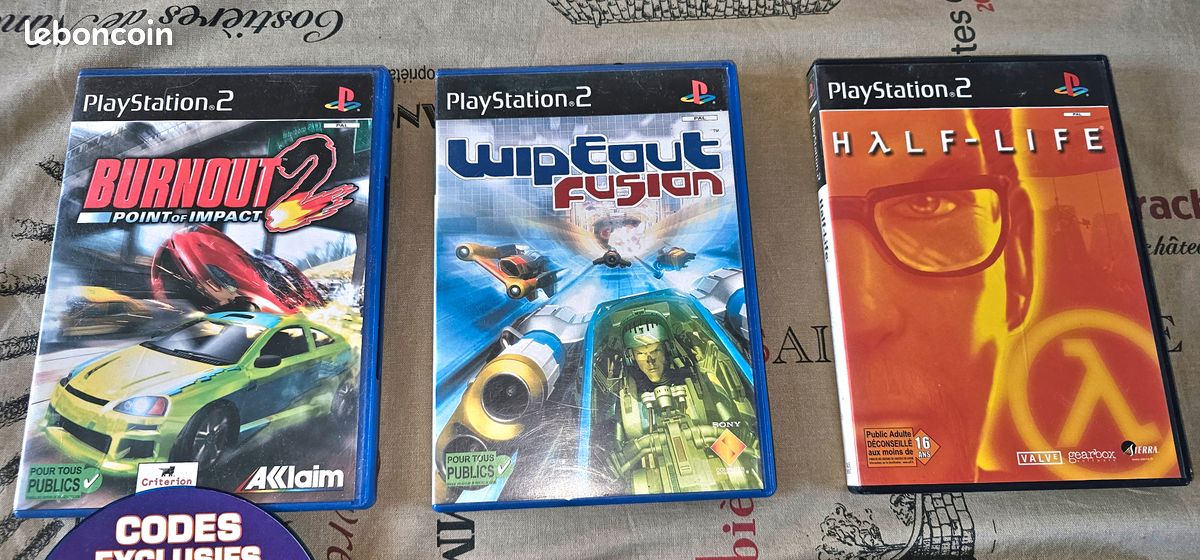 Playstation 2 + 5 jeux, manette et caméra... - Consoles