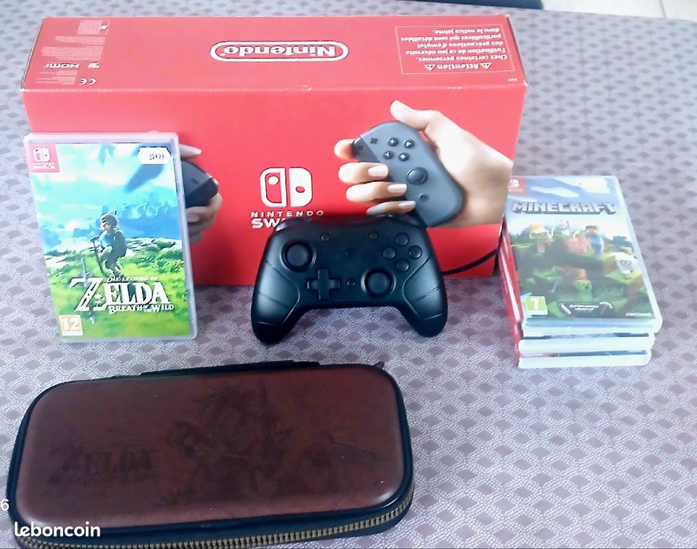 Nintendo switch noir avec les jeux - Consoles