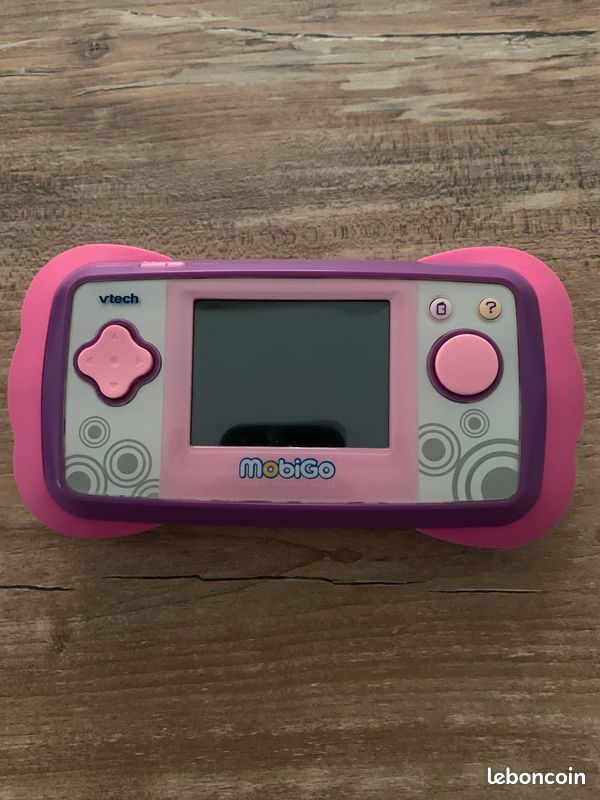 Console portable / tactile Vtech " Mobigo " + 2 jeux ( Hello Kitty ...