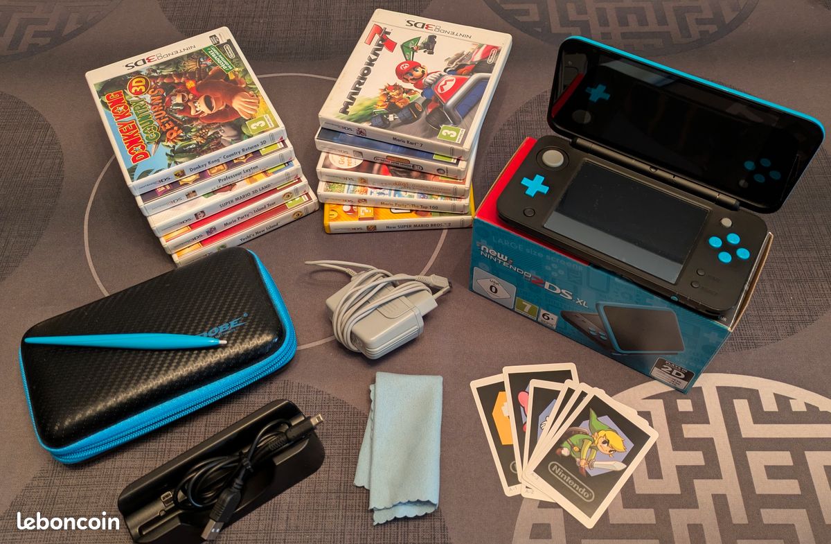 Nintendo New 2DS XL + 14 jeux - excellent état - Consoles